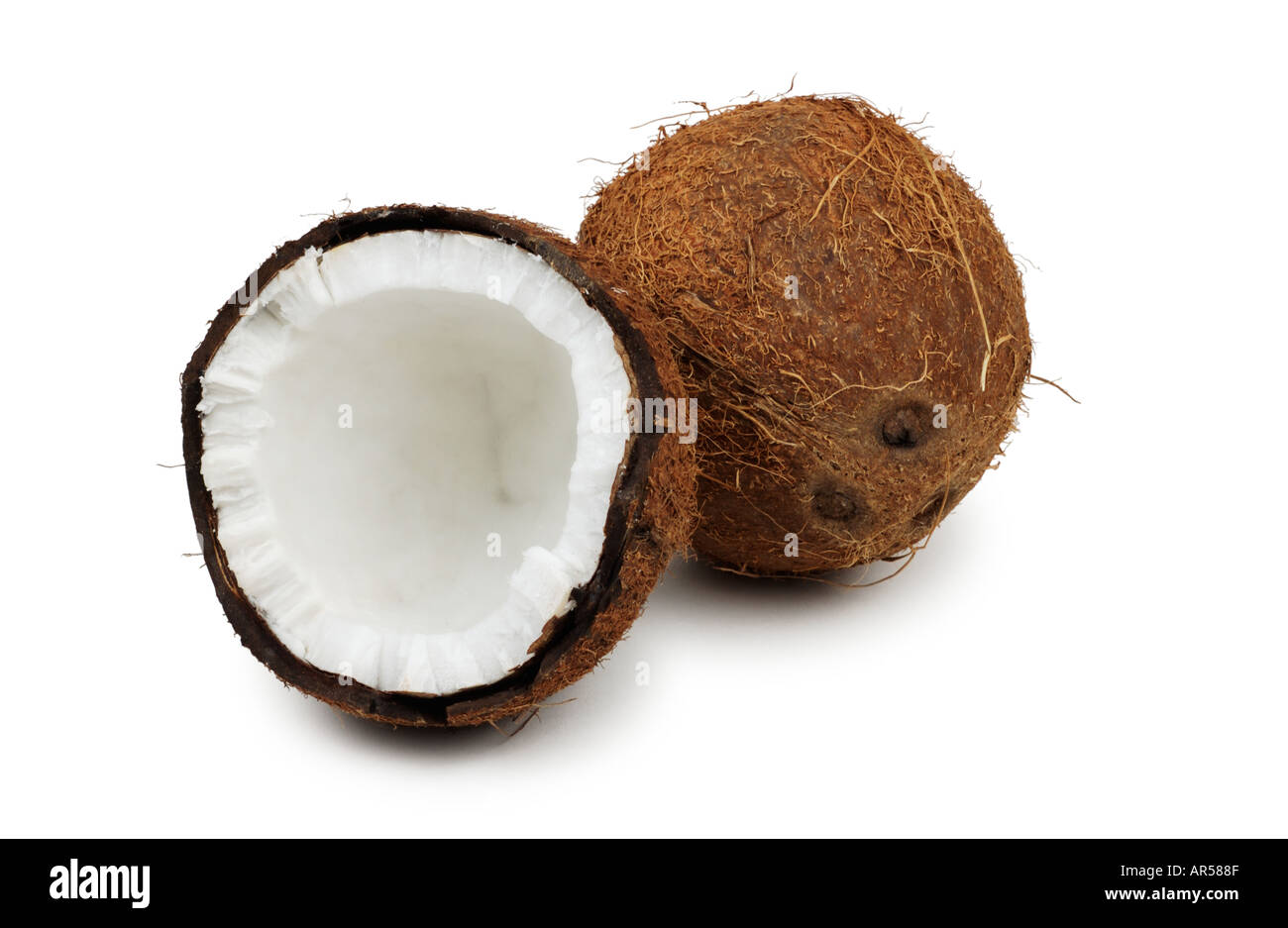 Whole and half coconut Stock Photo - Alamy