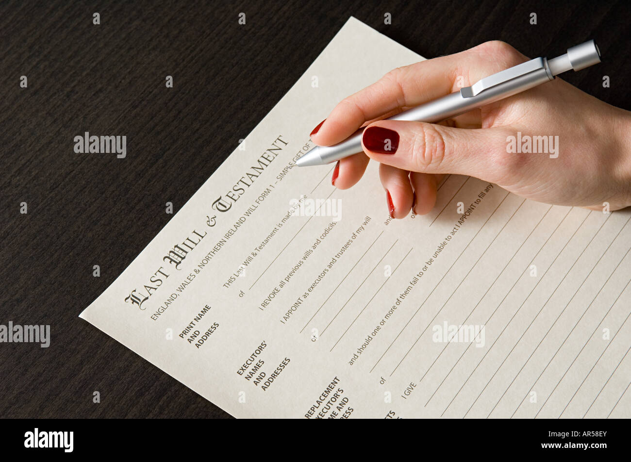 Woman signing will Stock Photo - Alamy