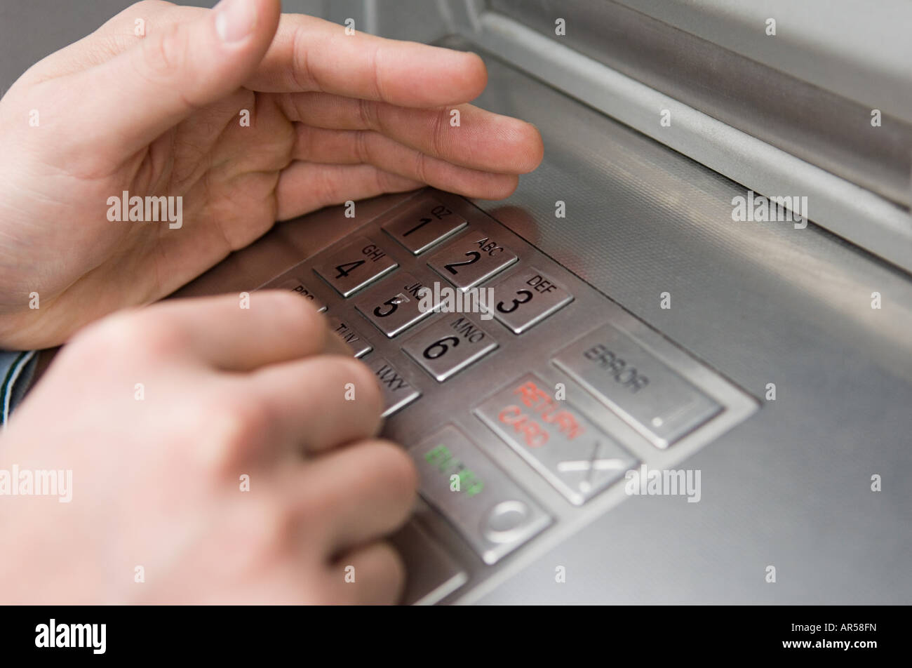 Person entering pin Stock Photo - Alamy