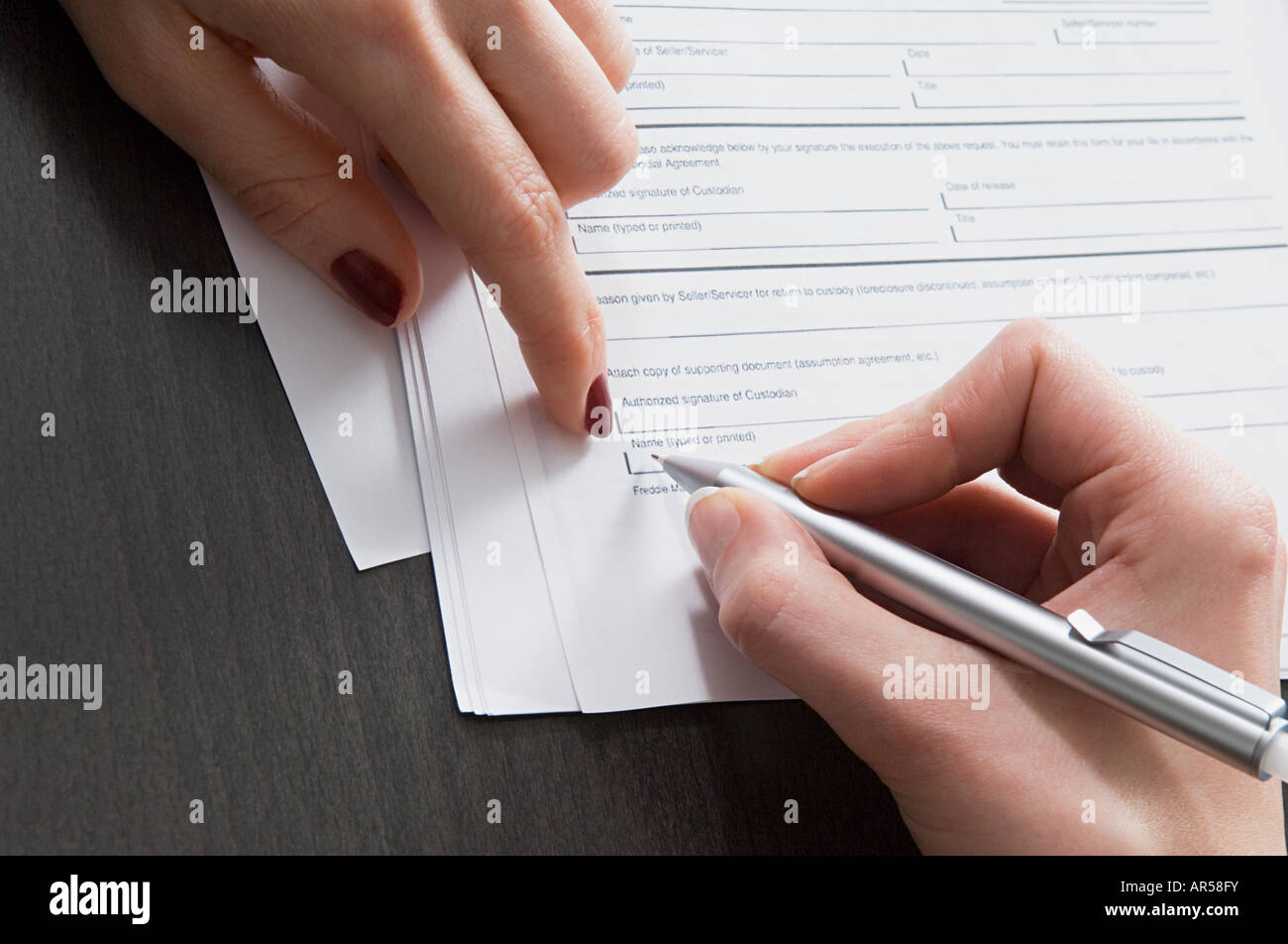 Person signing document Stock Photo - Alamy