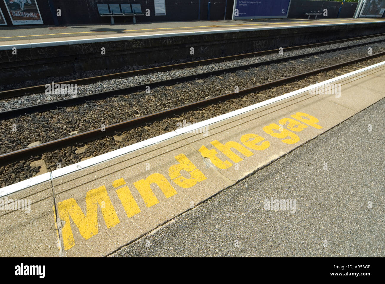 Mind the Gap warning sign on a railway platform England Stock Photo - Alamy