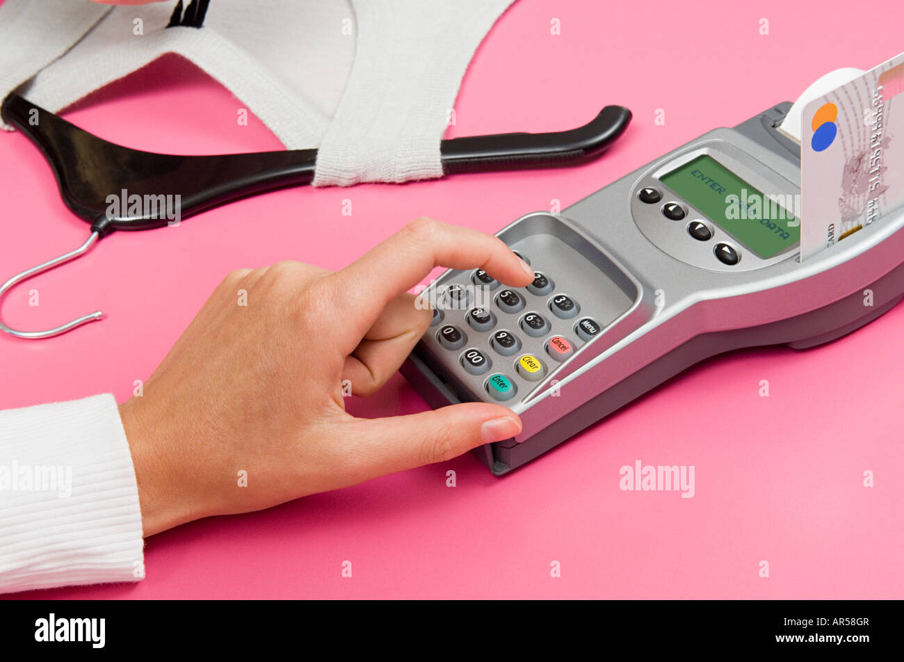 Person entering pin Stock Photo - Alamy