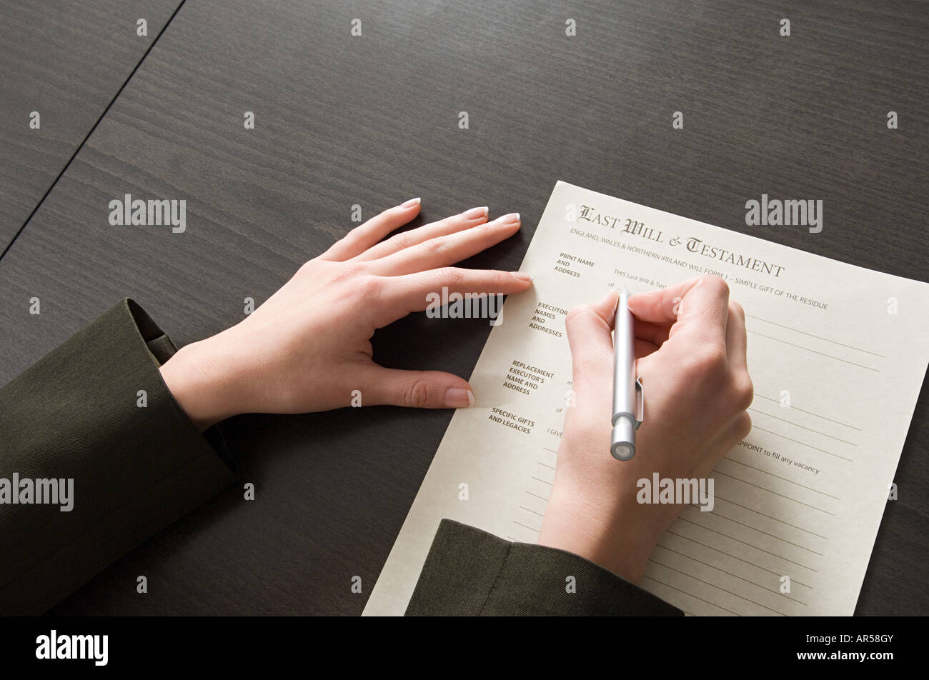 Woman signing will Stock Photo - Alamy
