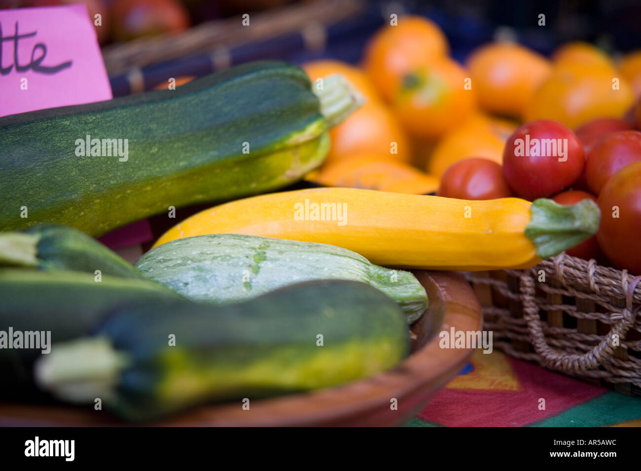 courgettes, zucchinis in different colours at the farmer's market in ...