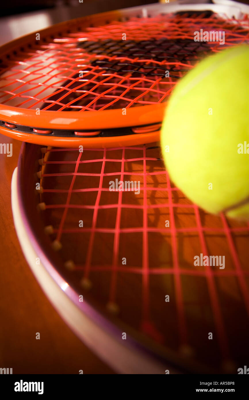 Tennis rackets and yellow ball Stock Photo - Alamy