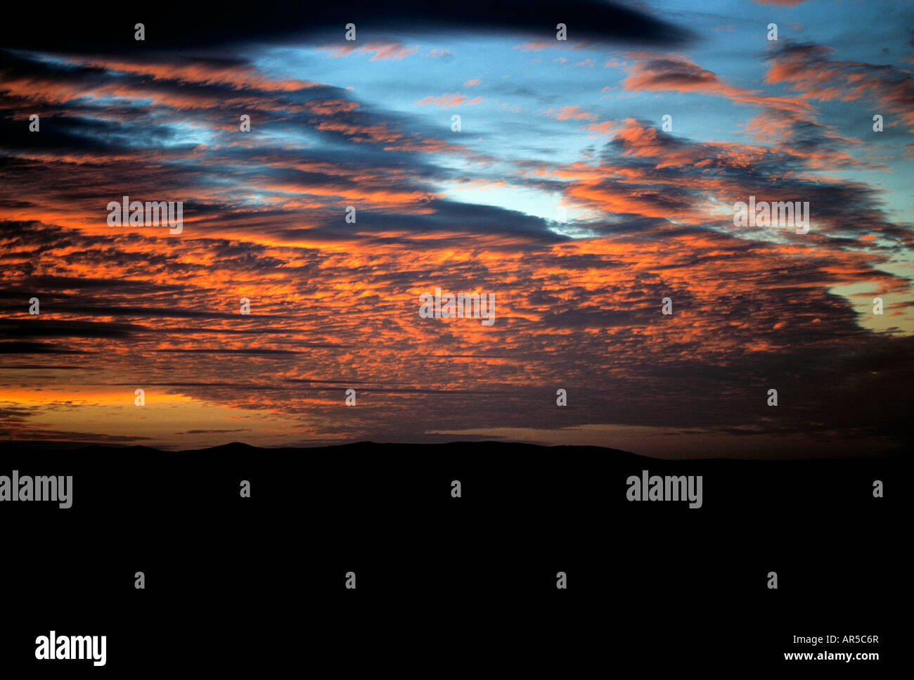 eerie sky over the african plains Stock Photo - Alamy