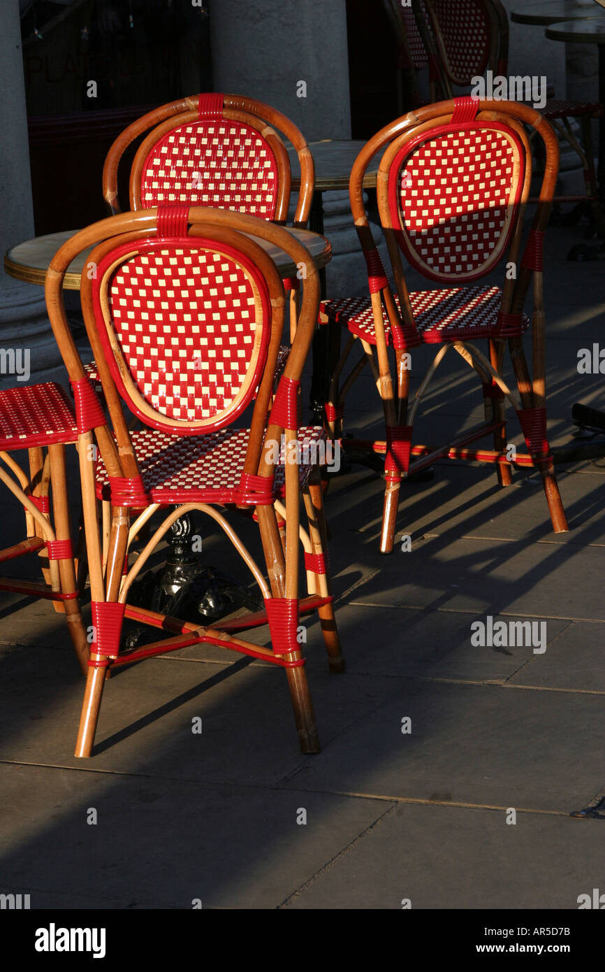 red wicker seats outside pavement cafe in cheltenham Stock Photo - Alamy