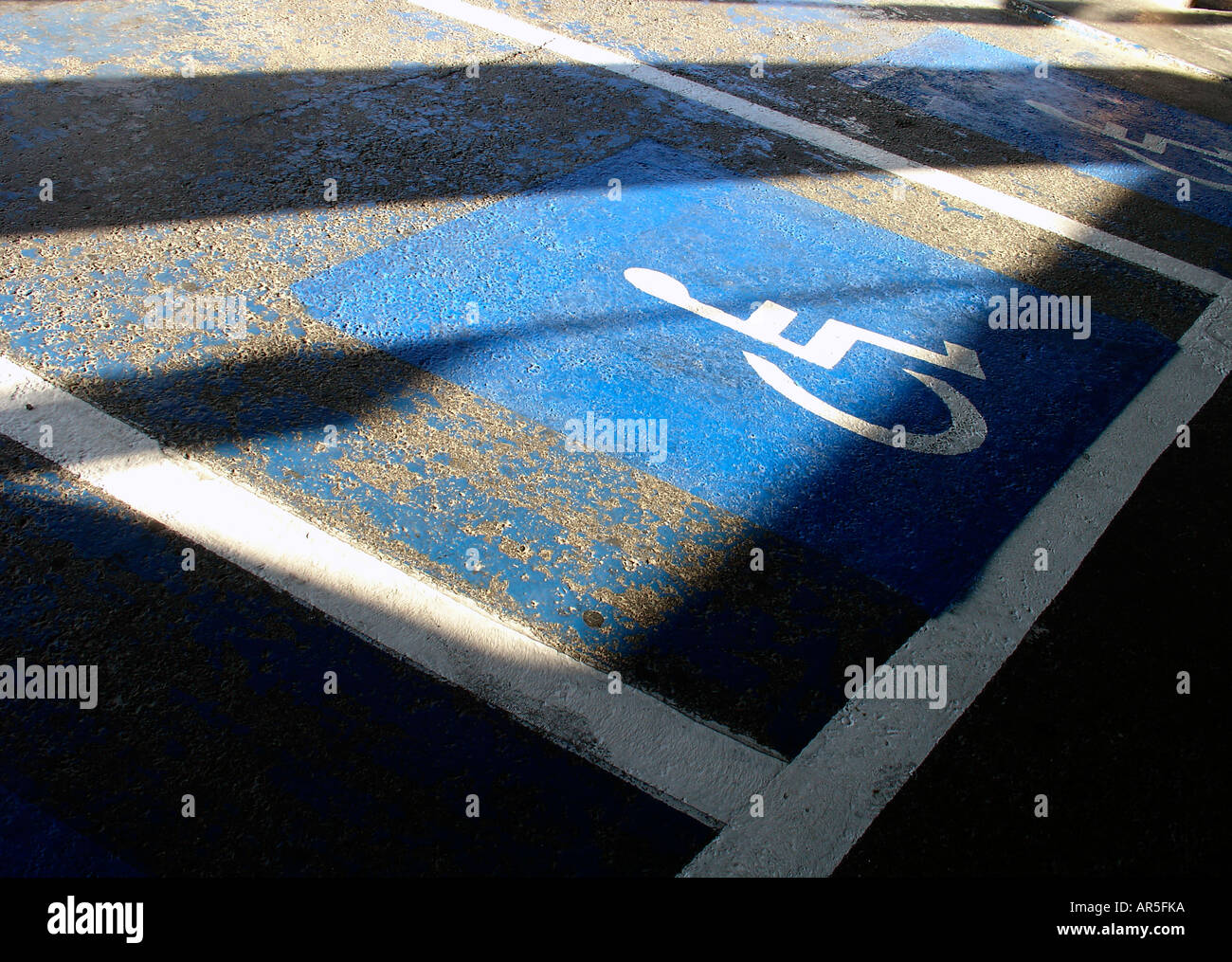 Painted parking sign for people with disability Stock Photo - Alamy