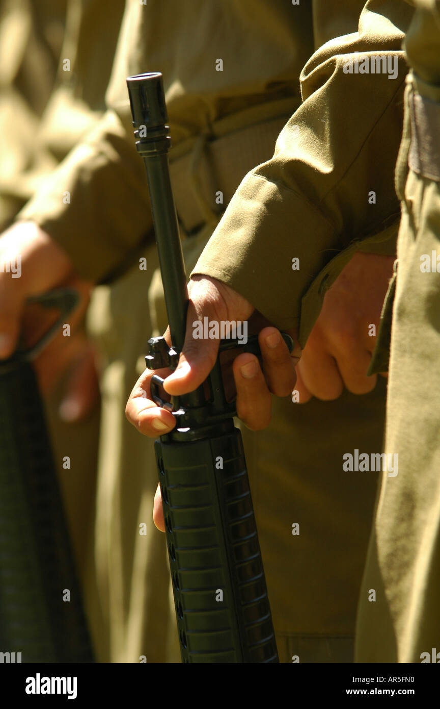 Row of IDF Soldiers holding M16 automatic rifles in Israel Stock Photo ...