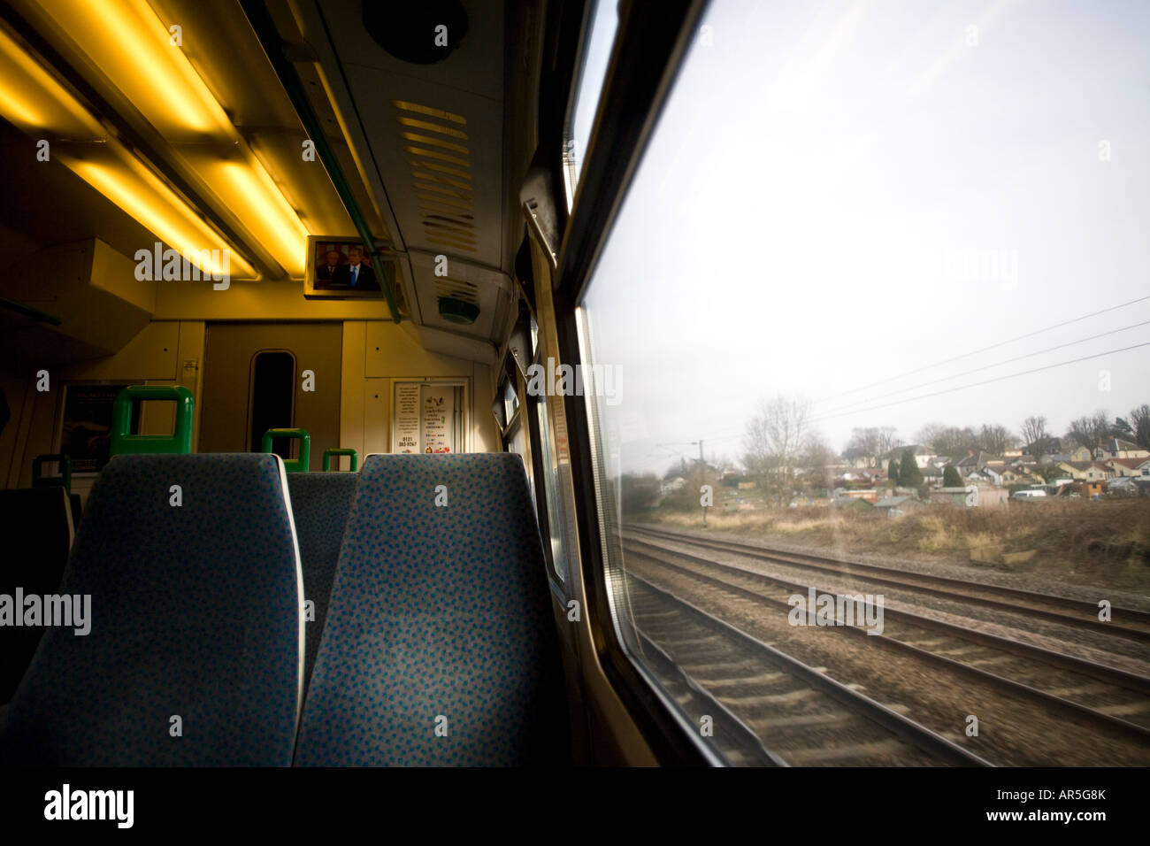 A view from a moving train on the London Midland line running through ...