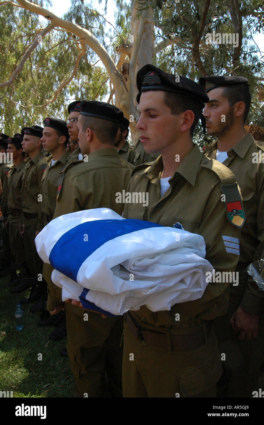 Israeli soldiers take part in a military ceremony for fallen soldier in ...