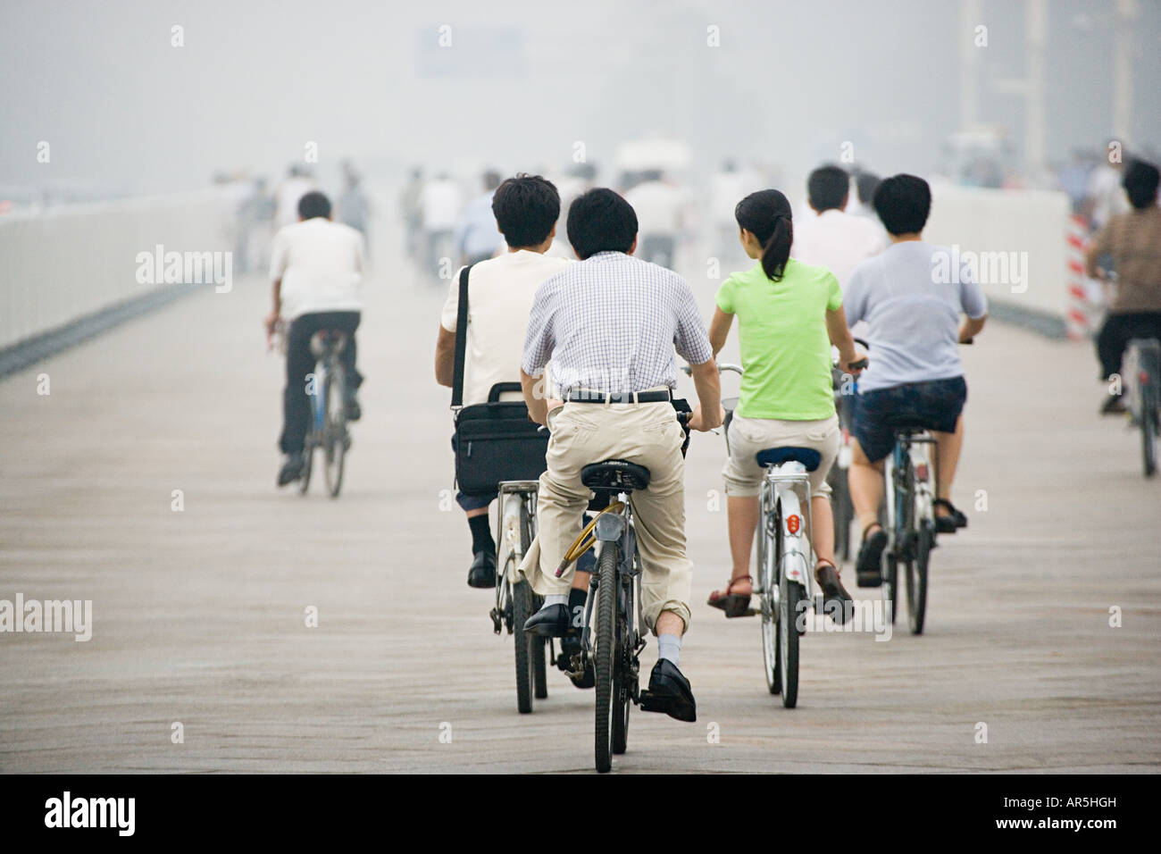 Chinese people cycling Stock Photo - Alamy