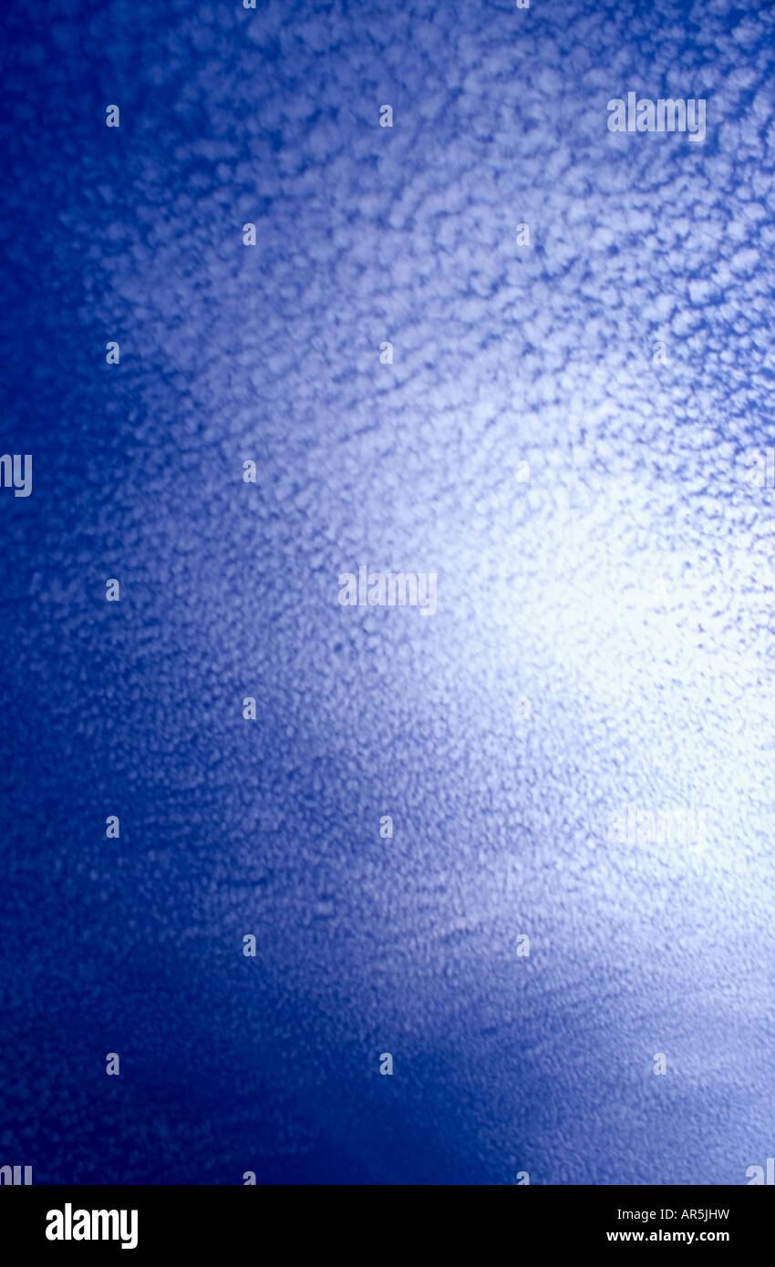 high cirrus clouds showing patterning and refracted colour Stock Photo ...