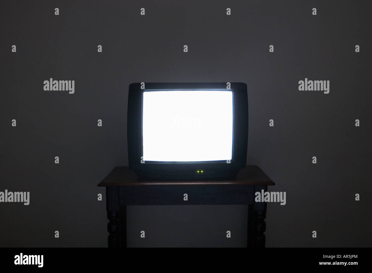 Illuminated television screen Stock Photo - Alamy