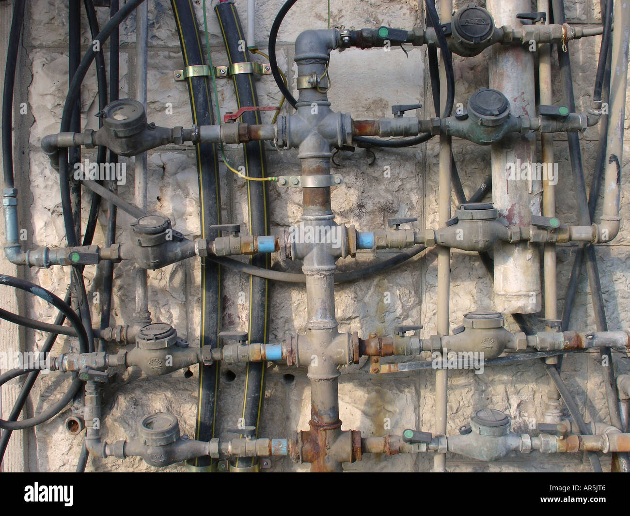 Lead drainpipes with water meters of a block residence building Tel ...