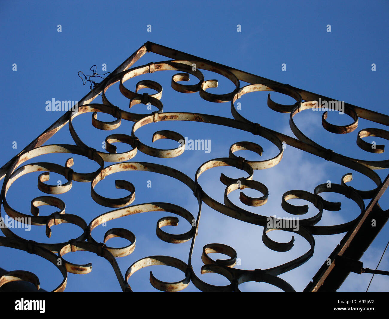 Curved “flowing” Art-Nouveau motif. Stairwell iron railing Stock Photo ...