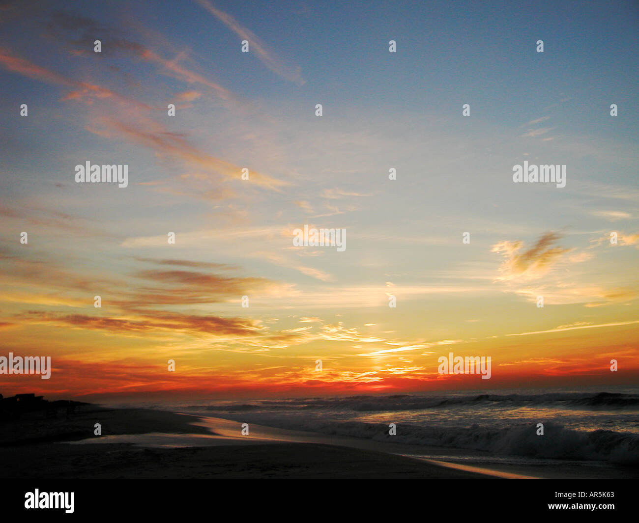 dawn breaks over ocean Stock Photo - Alamy