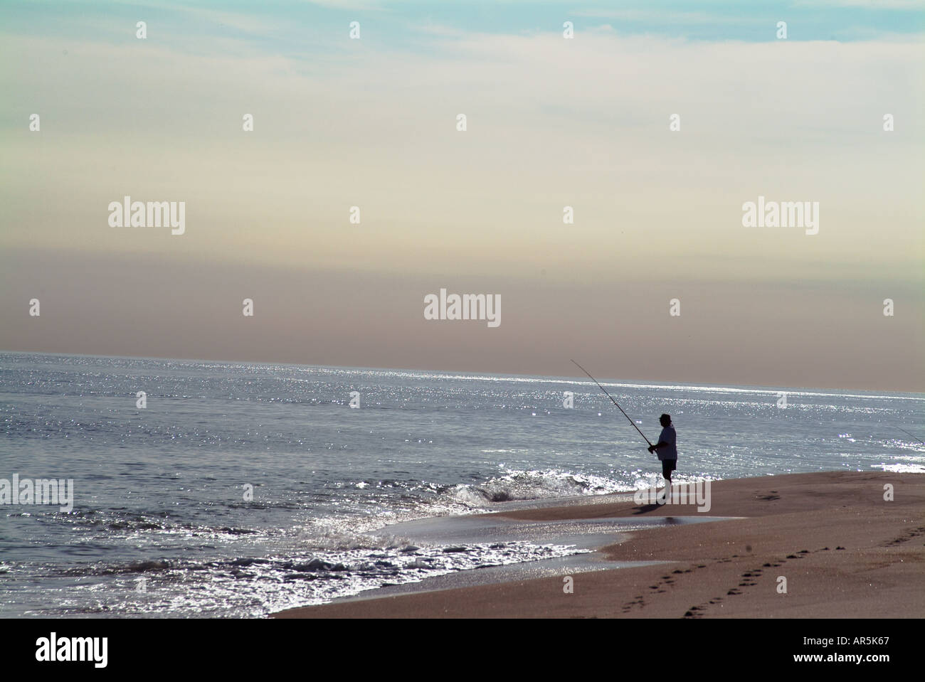 Surfcasting beach fishing hi-res stock photography and images - Alamy