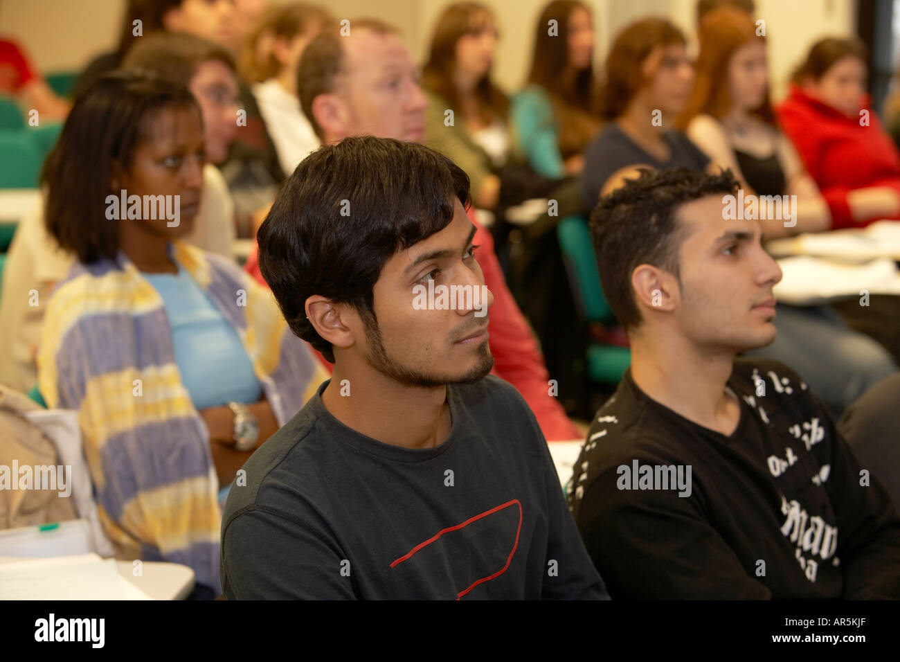 University students listening to a lecture Stock Photo - Alamy