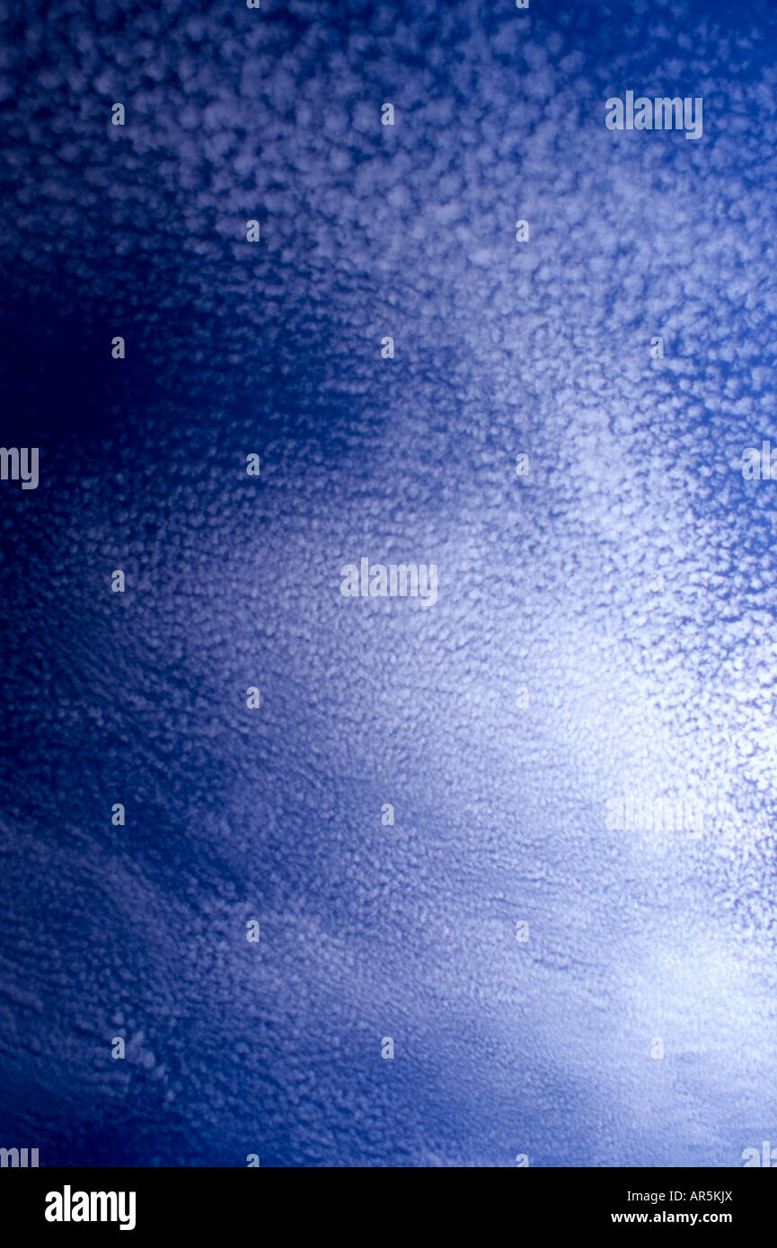 high cirrus clouds showing patterning and refracted colour Stock Photo ...