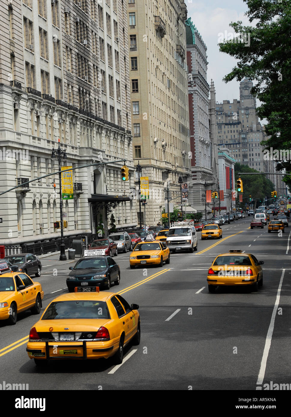 Cars and taxi cabs along Central Park West Manhattan New York Stock ...