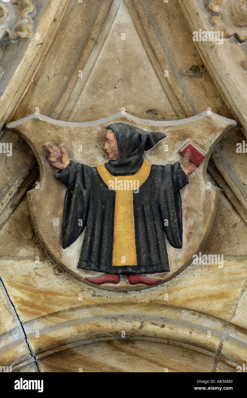 Carving of the Munchner Kindl (Munichs Little Monk) above the entrance ...