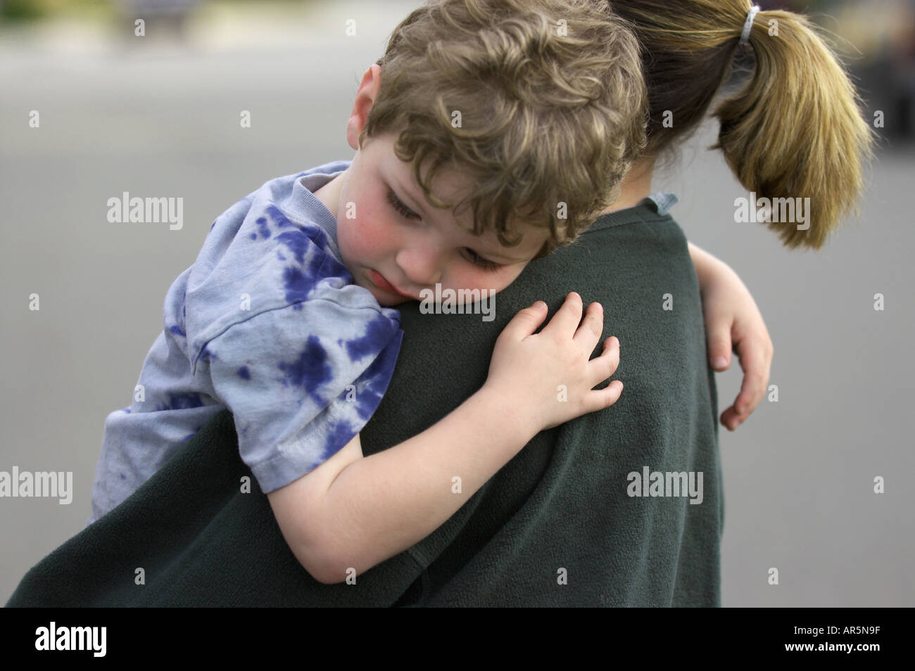 Months carrying hug hugging infant hi-res stock photography and images ...