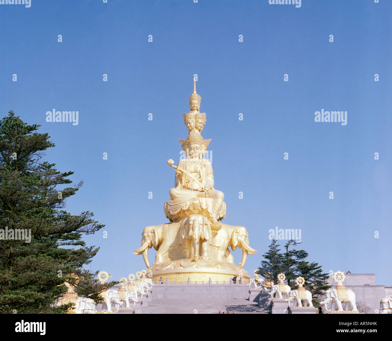 Multi faceted Buddha statue at top of Emei Shan Stock Photo - Alamy