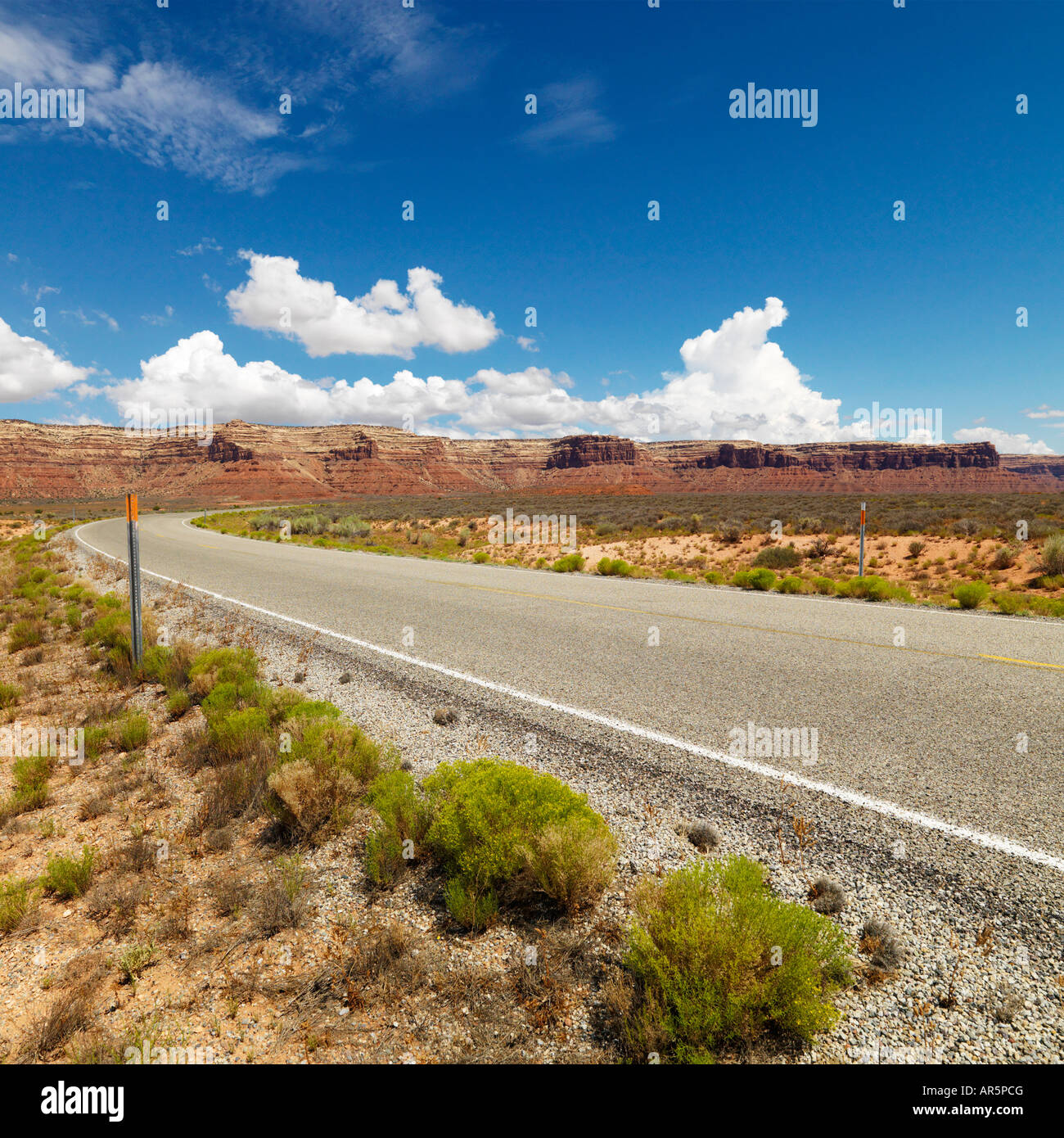Utah landscape with distant mountains and two lane road Stock Photo - Alamy
