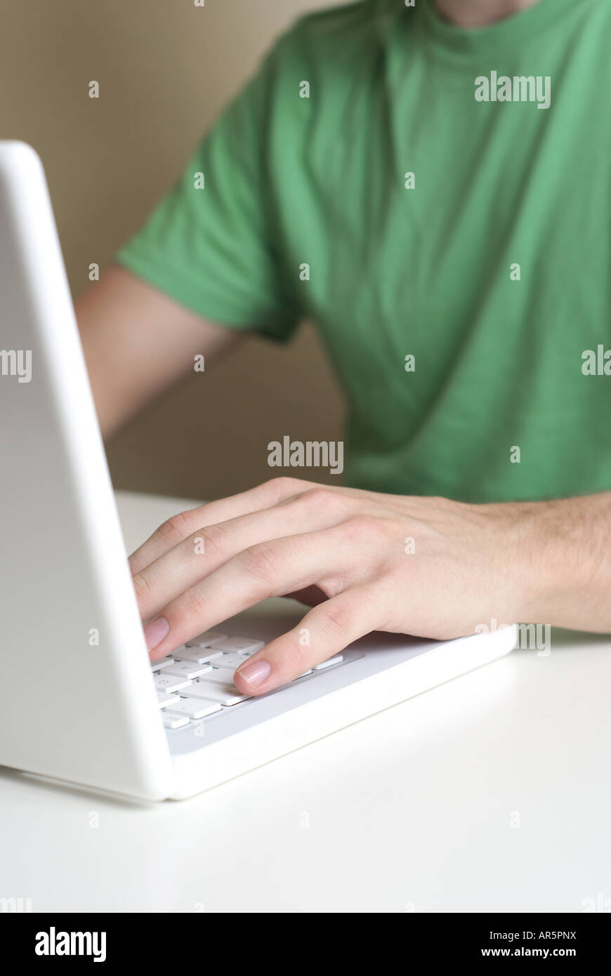 Male working at his laptop Focus on the hand Stock Photo - Alamy