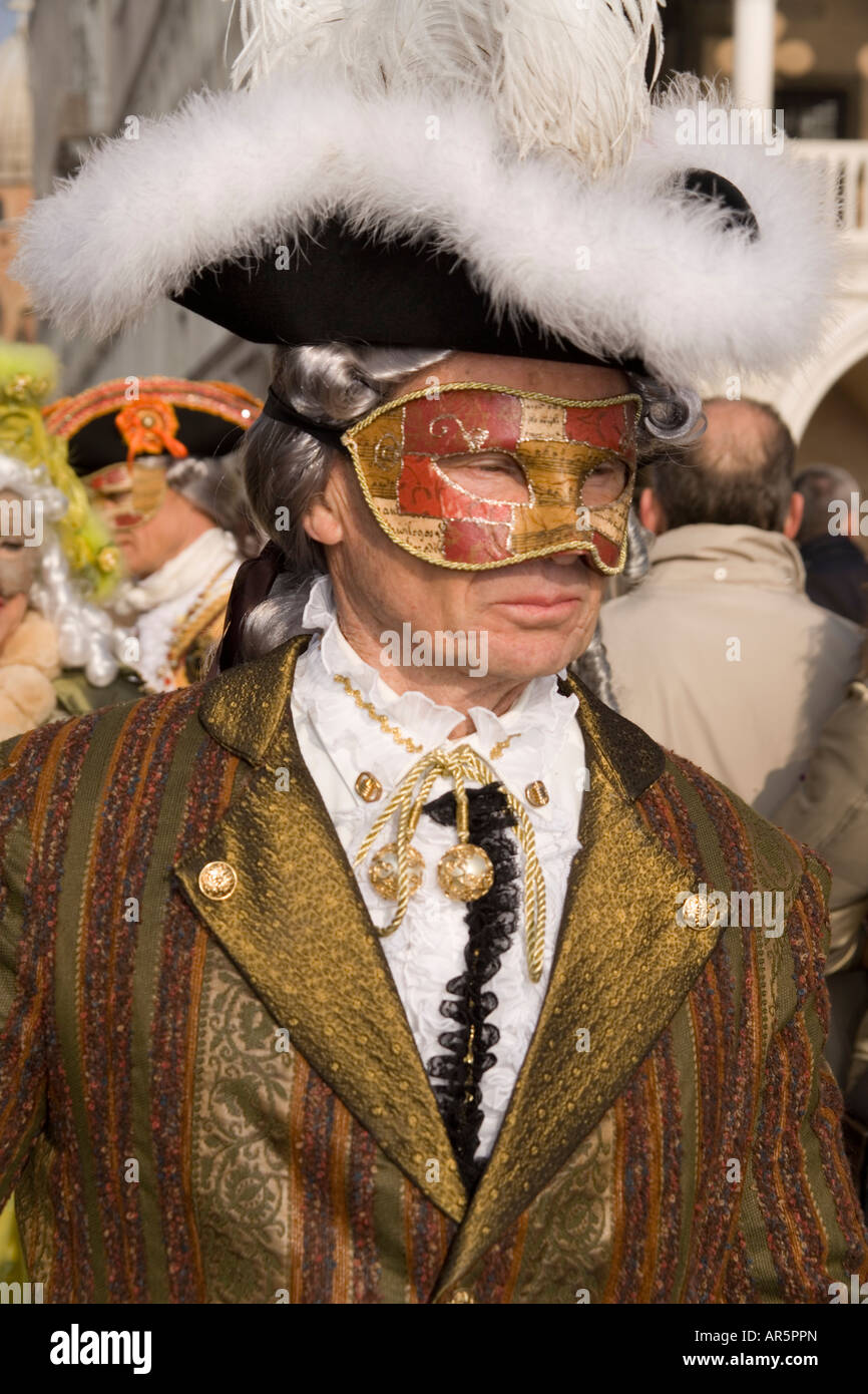 Reveller in mask and costume at the Venice carnival in St Mark's Square ...