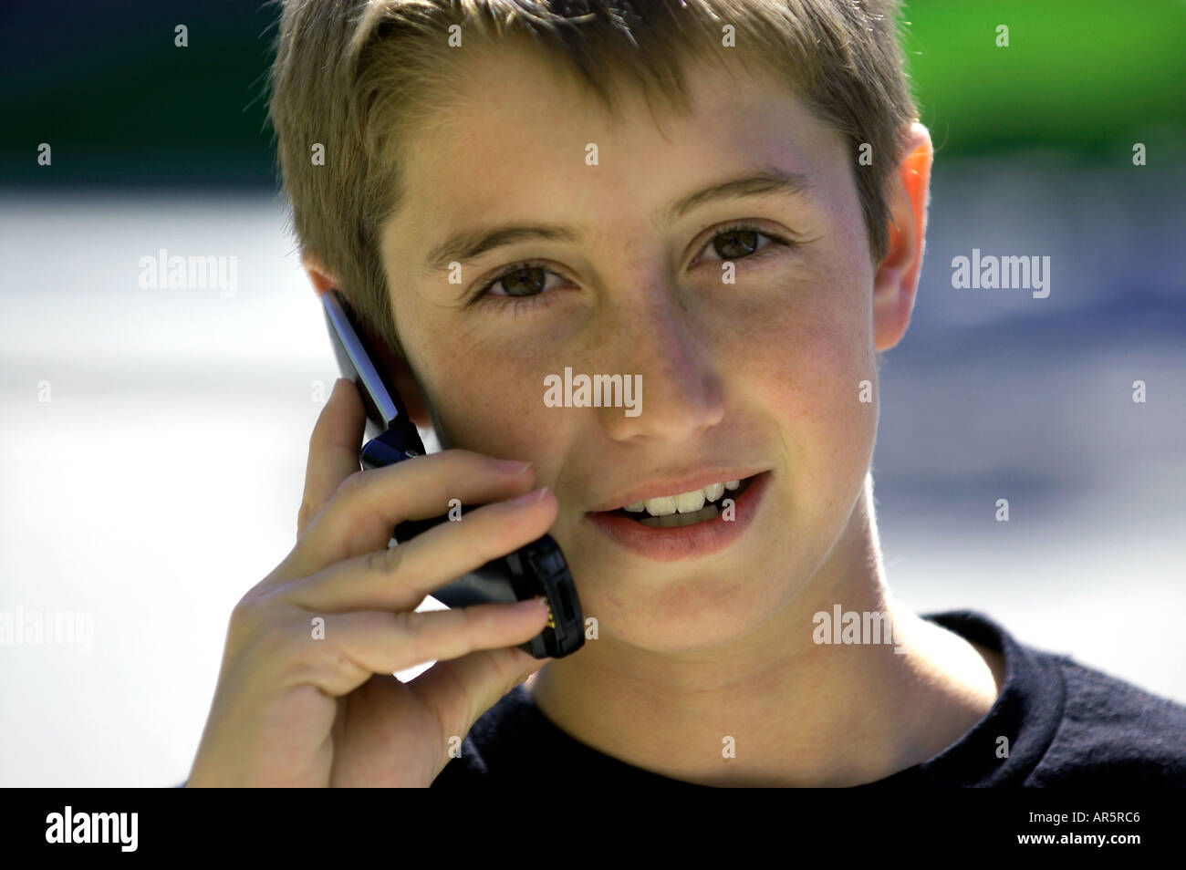 Teen boy phone talk hi-res stock photography and images - Alamy