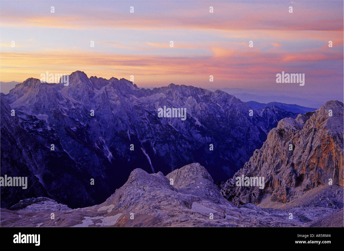 Romantic sunset sky and alpenglow, view from the hut Kredarica or ...
