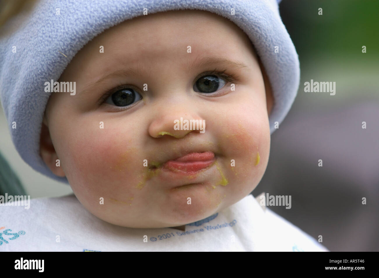 baby with food on face Stock Photo - Alamy