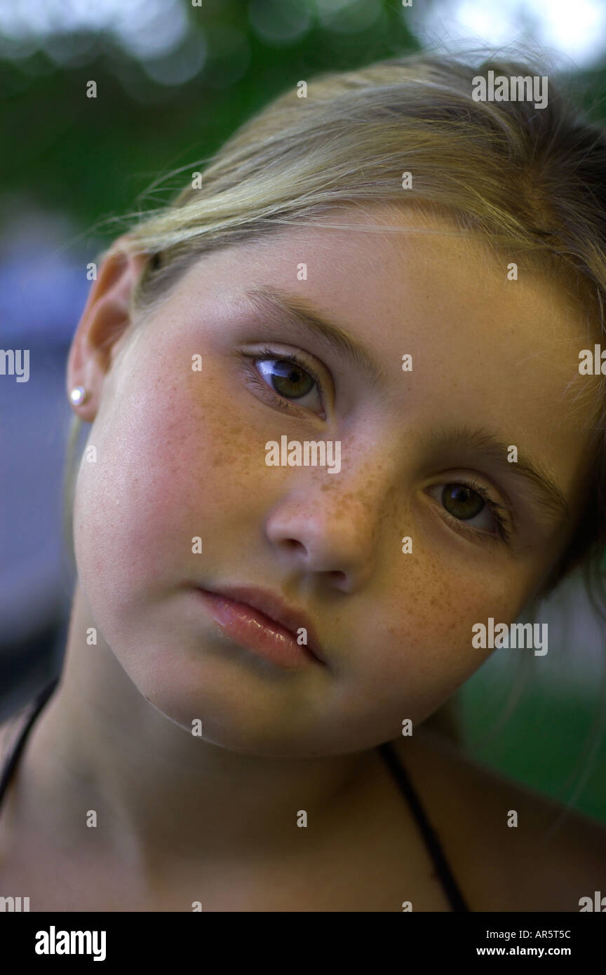 young girl with sad expression Stock Photo - Alamy