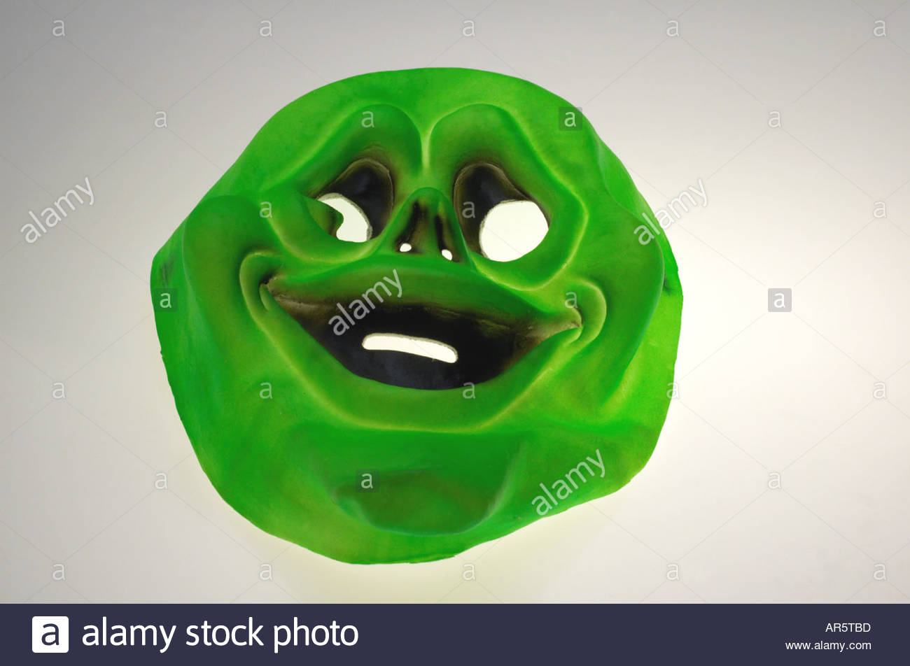 A green halloween mask Stock Photo - Alamy