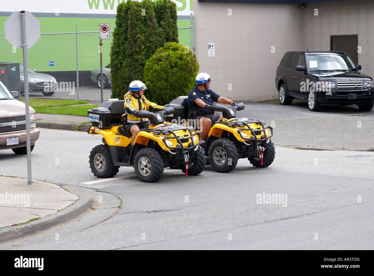 Police of the Vancouver beach patrol team on quad-bikes Stock Photo - Alamy