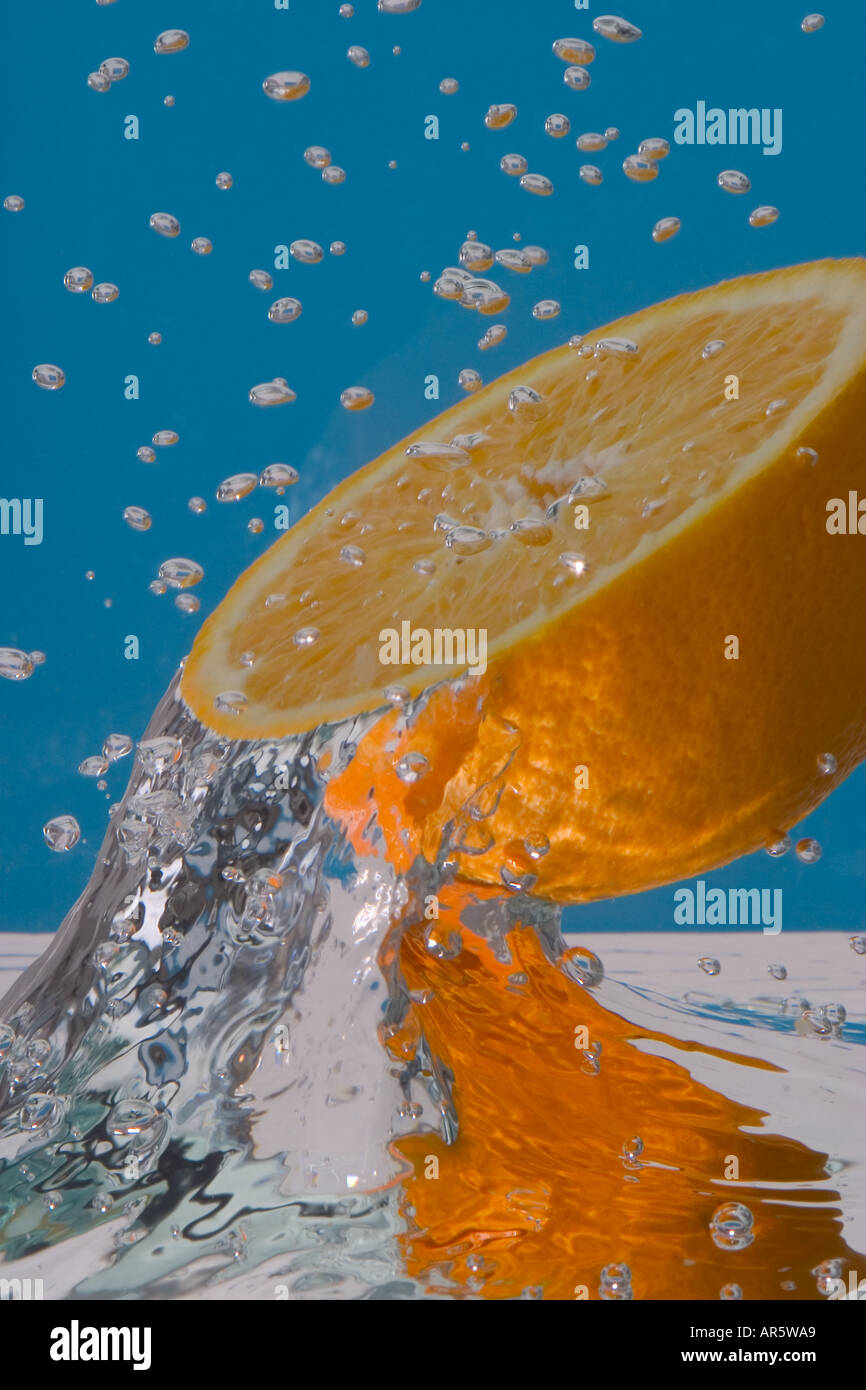 Orange under water Stock Photo - Alamy