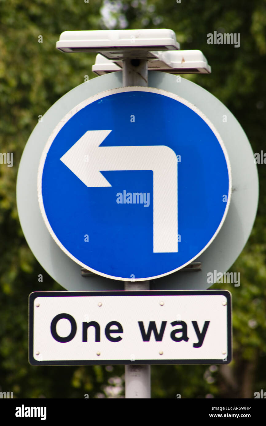 One way traffic bends left road sign Stock Photo - Alamy