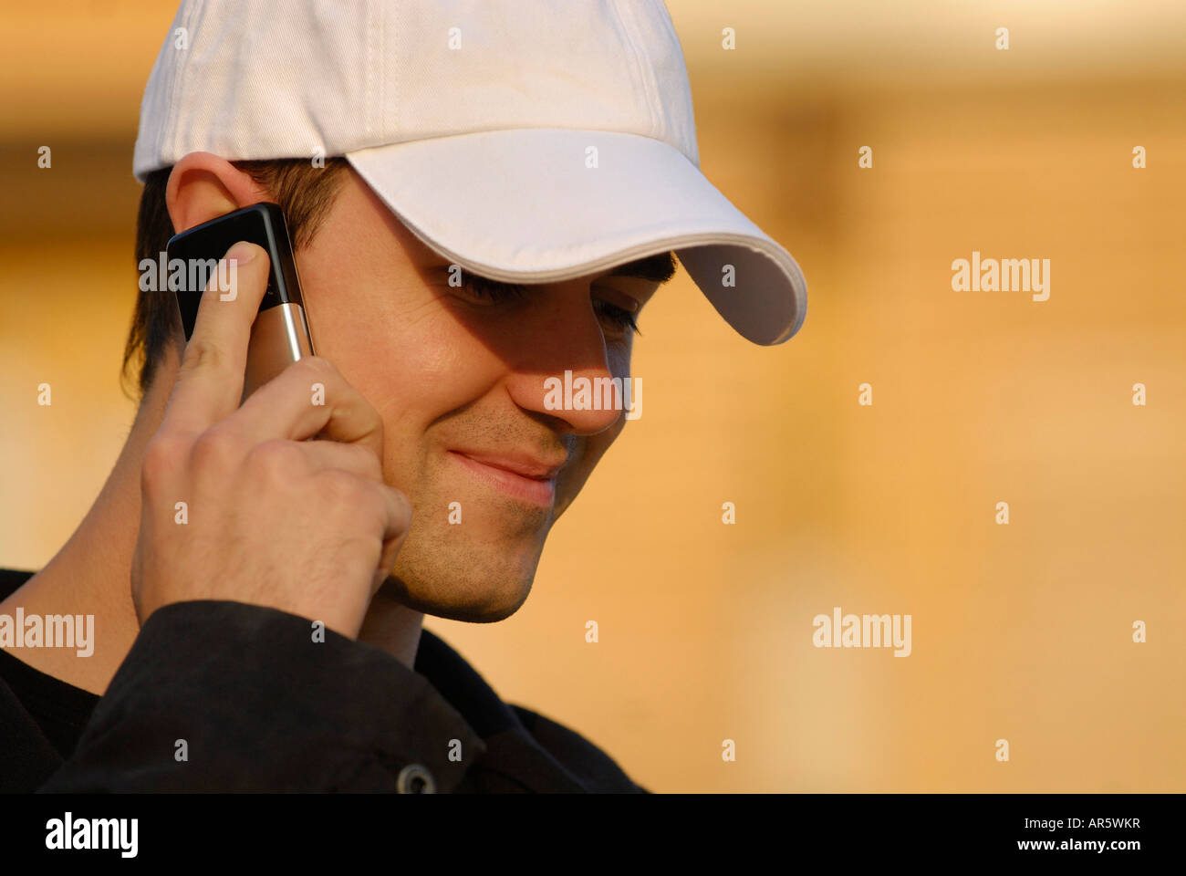 YOUNG MAN CALLING ON CELL PHONE Stock Photo - Alamy