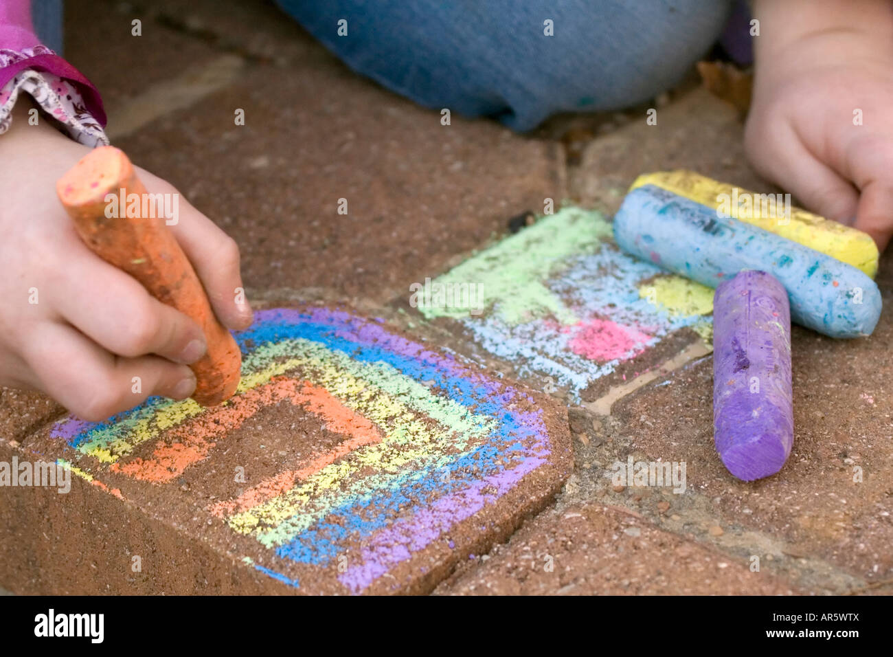 Chalk drawing rainbow color chalks hi-res stock photography and images ...