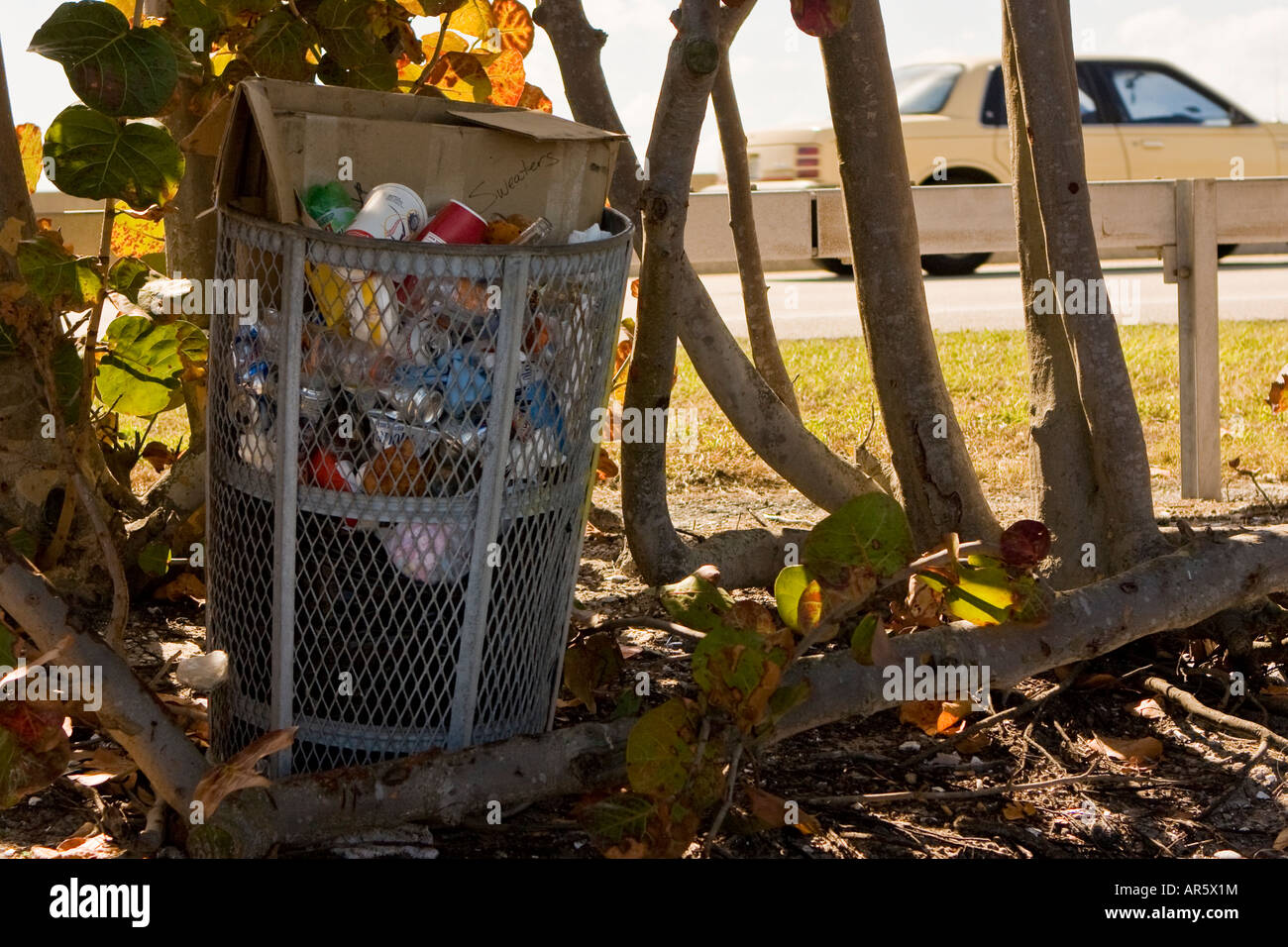 Roadside Trash Can Stock Photo - Alamy