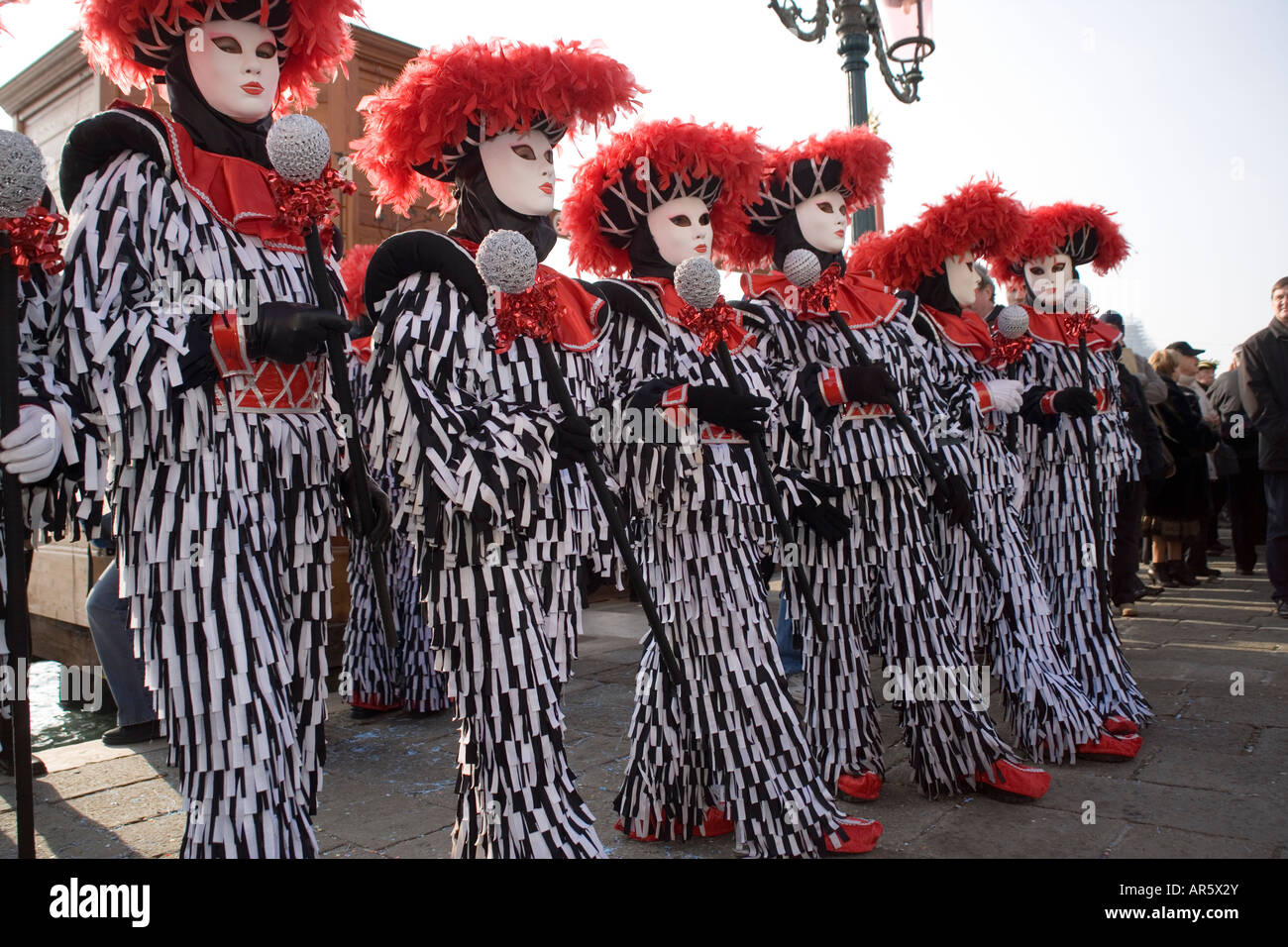 A group of revellers in St Mark's square at the Carnival, Venice, Italy ...
