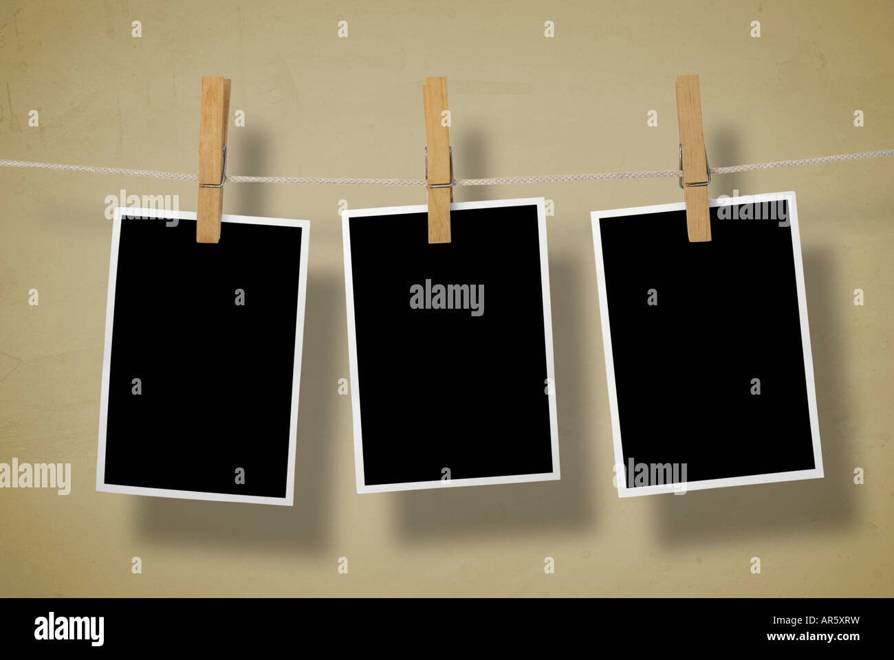 Developing picture Isolated on light brown background in a darkroom ...
