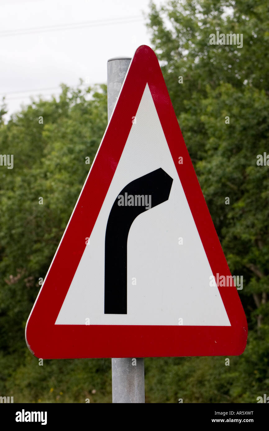 Road bends to the right road sign Stock Photo - Alamy