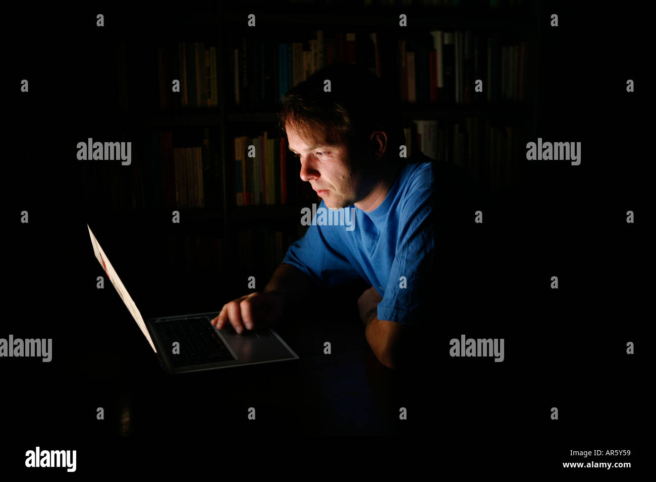 Man behind his laptop Stock Photo - Alamy