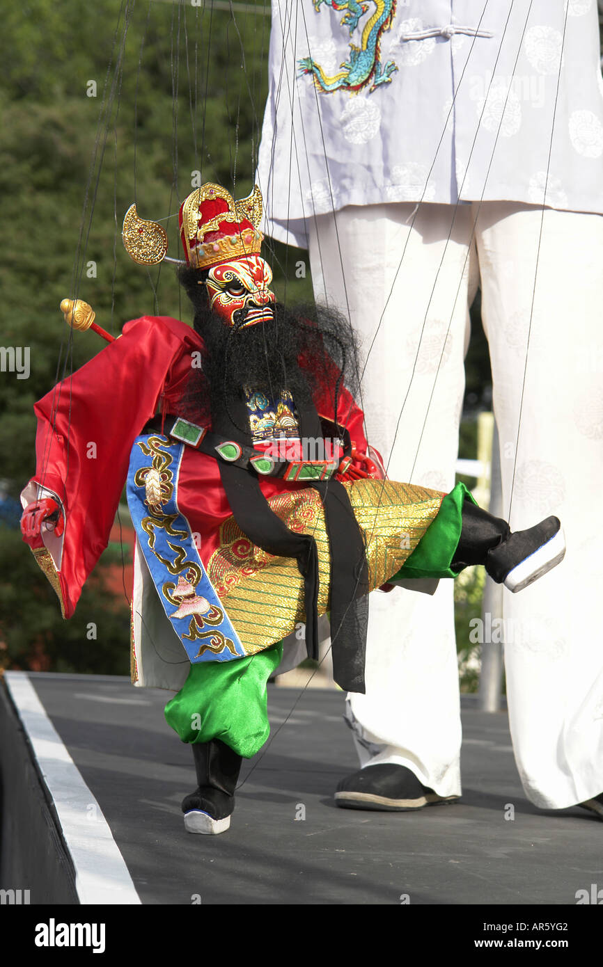 Chinese puppet performance on stage Stock Photo - Alamy