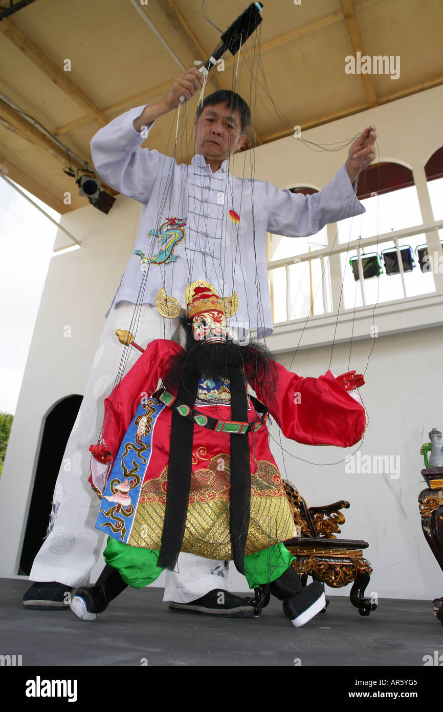 Chinese puppet performance on stage Stock Photo - Alamy
