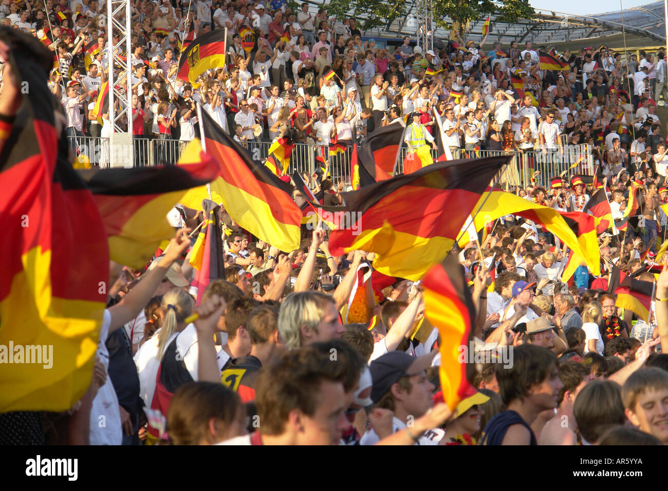 German Football fans at Olympia lake in Olympia park Munich Bavaria ...