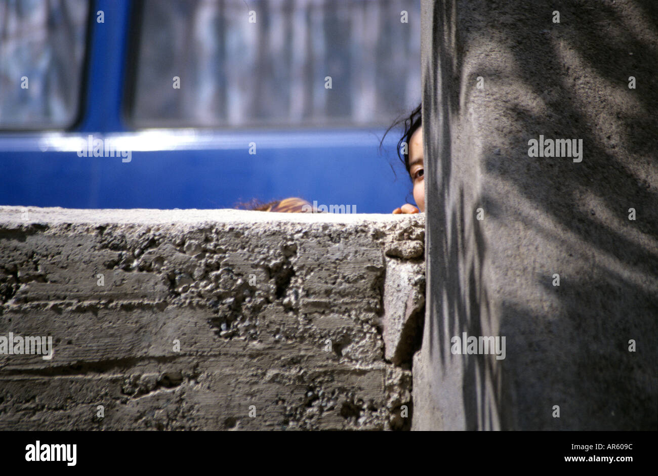 Moroccan children hiding from the camera Stock Photo - Alamy